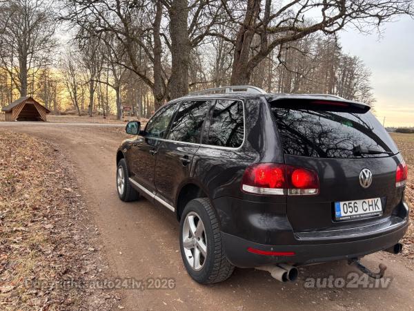 Black Volkswagen Touareg 2007 in Tallinn, with an engine capacity of 3.00 L and mileage of 0 thousand km for 6000 €, photo 5 on AUTOMOTO.COM.LV