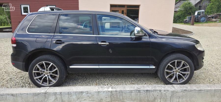 Black Volkswagen Touareg 2007 in Plunge, with an engine capacity of 3.00 L and mileage of 429 thousand km for 5000 €, photo 5 on AUTOMOTO.COM.LV