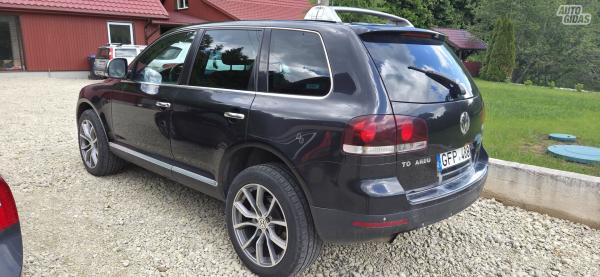 Black Volkswagen Touareg 2007 in Plunge, with an engine capacity of 3.00 L and mileage of 429 thousand km for 5000 €, photo 5 on AUTOMOTO.COM.LV