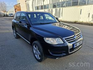 Melns Volkswagen Touareg 2007 Rīga, ar dzinēja tilpumu 3.00 L un nobraukumu 430 tūkst. km par 3850 €, foto  vietnē AUTOMOTO.COM.LV