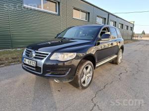 Melns Volkswagen Touareg 2007 Rīga, ar dzinēja tilpumu 3.00 L un nobraukumu 430 tūkst. km par 3850 €, foto 4 vietnē AUTOMOTO.COM.LV
