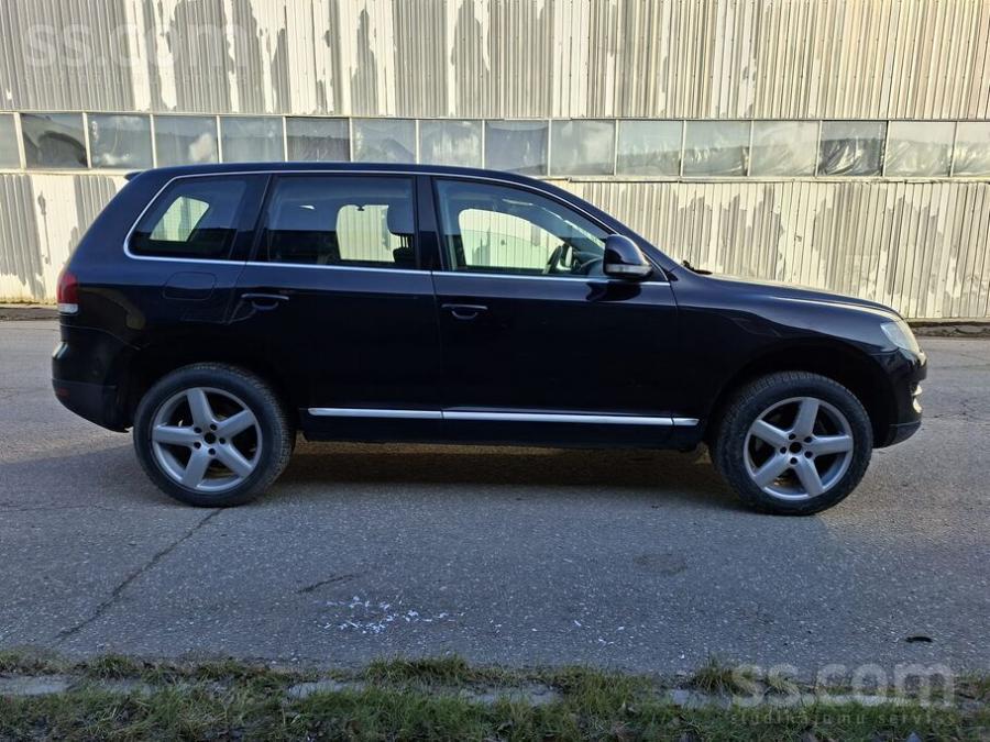 Melns Volkswagen Touareg 2007 Rīga, ar dzinēja tilpumu 3.00 L un nobraukumu 430 tūkst. km par 3850 €, foto 9 vietnē AUTOMOTO.COM.LV