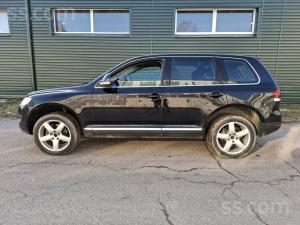 Melns Volkswagen Touareg 2007 Rīga, ar dzinēja tilpumu 3.00 L un nobraukumu 430 tūkst. km par 3850 €, foto 10 vietnē AUTOMOTO.COM.LV