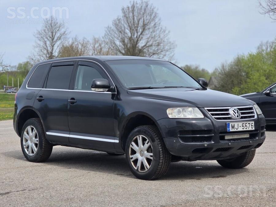 Black Volkswagen Touareg 2007 in Liepaja, with an engine capacity of 3.00 L and mileage of 282 thousand km for 2990 €, photo 6 on AUTOMOTO.COM.LV