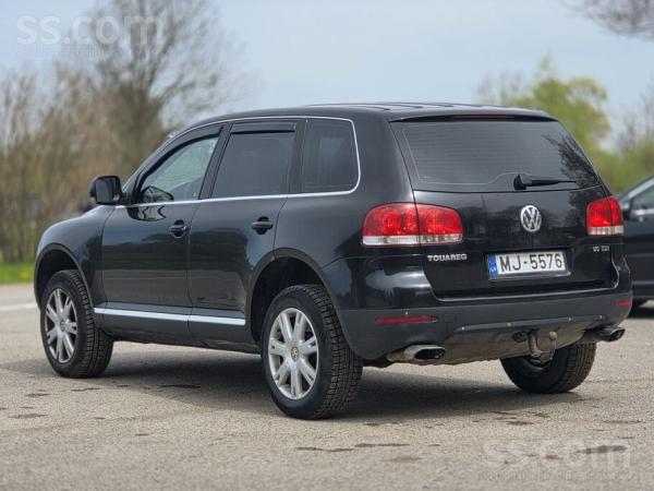 Black Volkswagen Touareg 2007 in Liepaja, with an engine capacity of 3.00 L and mileage of 282 thousand km for 2990 €, photo 10 on AUTOMOTO.COM.LV