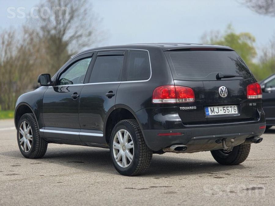 Black Volkswagen Touareg 2007 in Liepaja, with an engine capacity of 3.00 L and mileage of 282 thousand km for 2990 €, photo 11 on AUTOMOTO.COM.LV