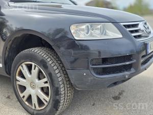 Black Volkswagen Touareg 2007 in Liepaja, with an engine capacity of 3.00 L and mileage of 282 thousand km for 2990 €, photo 14 on AUTOMOTO.COM.LV