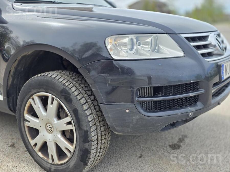 Black Volkswagen Touareg 2007 in Liepaja, with an engine capacity of 3.00 L and mileage of 282 thousand km for 2990 €, photo 14 on AUTOMOTO.COM.LV