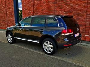 Black Volkswagen Touareg 2007 in Riga, with an engine capacity of 3.00 L and mileage of 289 thousand km for 7100 €, photo 5 on AUTOMOTO.COM.LV