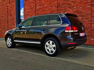 Black Volkswagen Touareg 2007 in Riga, with an engine capacity of 3.00 L and mileage of 289 thousand km for 7100 €, photo 6 on AUTOMOTO.COM.LV