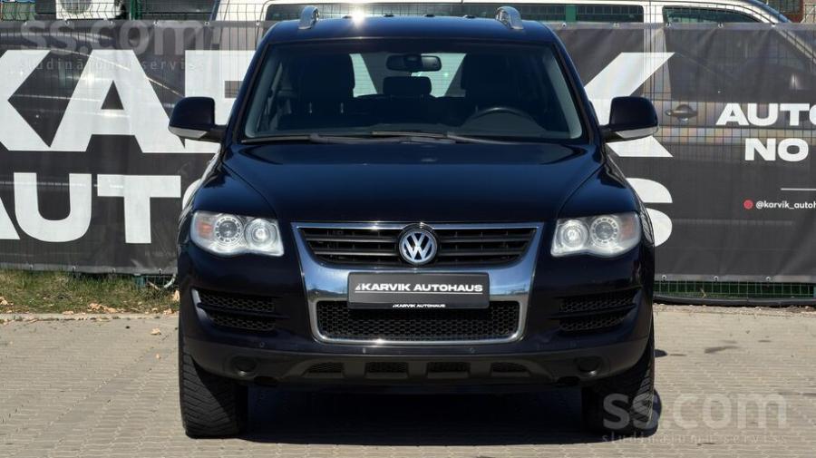 Melns Volkswagen Touareg 2007 Liepāja, ar dzinēja tilpumu 2.50 L un nobraukumu 369 tūkst. km par 3390 €, foto 1 vietnē AUTOMOTO.COM.LV