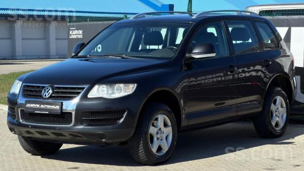 Black Volkswagen Touareg 2007 in Liepaja, with an engine capacity of 2.50 L and mileage of 369 thousand km for 3390 €, photo 8 on AUTOMOTO.COM.LV