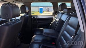 Melns Volkswagen Touareg 2007 Liepāja, ar dzinēja tilpumu 2.50 L un nobraukumu 369 tūkst. km par 3390 €, foto 19 vietnē AUTOMOTO.COM.LV
