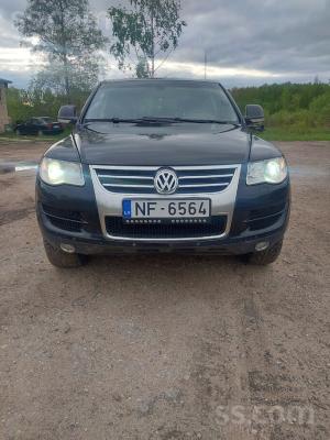 Black Volkswagen Touareg 2007 in Kraslava, with an engine capacity of 3.00 L and mileage of 400 thousand km for 3950 €, photo  on AUTOMOTO.COM.LV