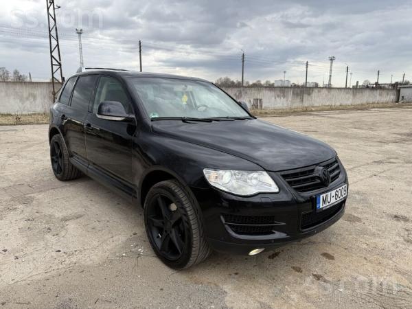 Melns Volkswagen Touareg 2007 Rīga, ar dzinēja tilpumu 3.00 L un nobraukumu 300 tūkst. km par 6900 €, foto 5 vietnē AUTOMOTO.COM.LV
