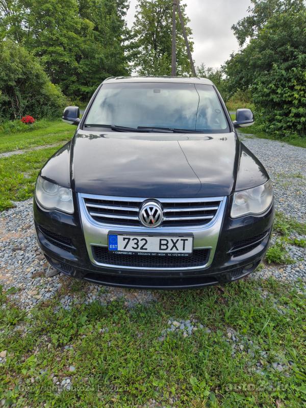Black Volkswagen Touareg 2007 in Tallinn, with an engine capacity of 3.00 L and mileage of 311 thousand km for 3999 €, photo 1 on AUTOMOTO.COM.LV