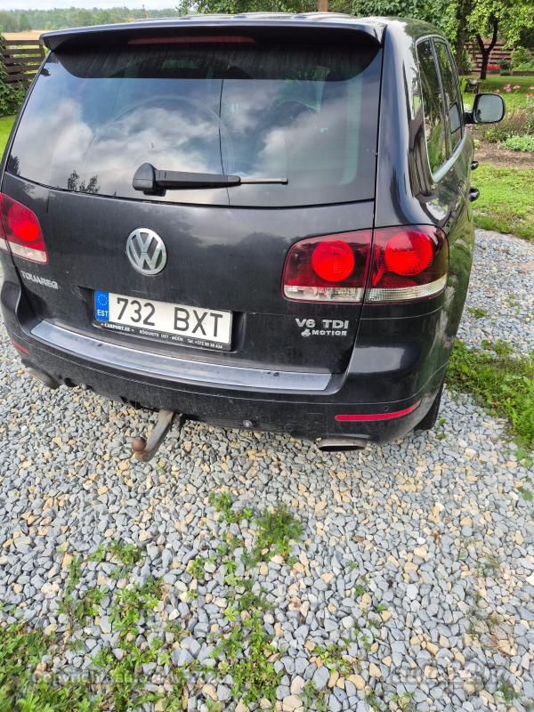 Black Volkswagen Touareg 2007 in Tallinn, with an engine capacity of 3.00 L and mileage of 311 thousand km for 3999 €, photo 3 on AUTOMOTO.COM.LV