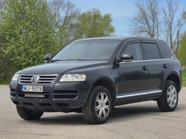 Black Volkswagen Touareg 2007 in Grobiņa, with an engine capacity of 3.00 L and mileage of 282 thousand km for 2990 €, photo 2 on AUTOMOTO.COM.LV