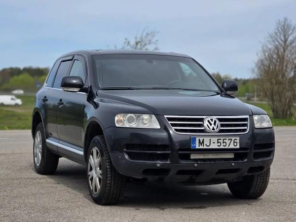 Black Volkswagen Touareg 2007 in Grobiņa, with an engine capacity of 3.00 L and mileage of 282 thousand km for 2990 €, photo 4 on AUTOMOTO.COM.LV