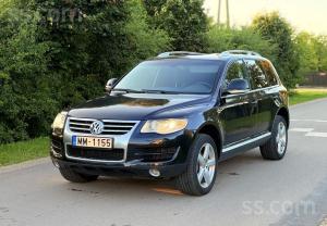 Black Volkswagen Touareg 2007 in Jelgava, with an engine capacity of 3.00 L and mileage of 308 thousand km for 5450 €, photo  on AUTOMOTO.COM.LV