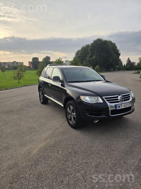 Melns Volkswagen Touareg 2007 Bauska, ar dzinēja tilpumu 3.00 L un nobraukumu 407 tūkst. km par 5200 €, foto 1 vietnē AUTOMOTO.COM.LV