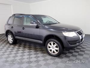 Black Volkswagen Touareg 2007 in Tallinn, with an engine capacity of 2.50 L and mileage of 259 thousand km for 1499 €, photo  on AUTOMOTO.COM.LV