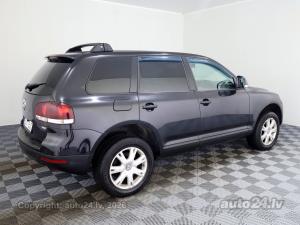 Black Volkswagen Touareg 2007 in Tallinn, with an engine capacity of 2.50 L and mileage of 259 thousand km for 1499 €, photo 4 on AUTOMOTO.COM.LV