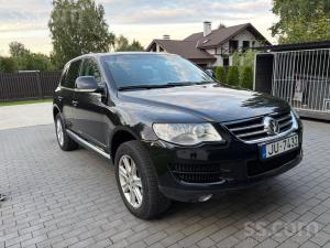 Black Volkswagen Touareg 2007 in Jelgava, with an engine capacity of 3.00 L and mileage of 411 thousand km for 5500 €, photo  on AUTOMOTO.COM.LV