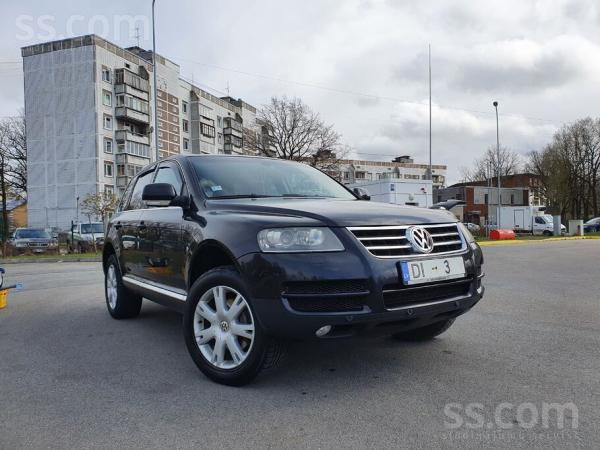 Melns Volkswagen Touareg 2007 Rīga, ar dzinēja tilpumu 3.00 L un nobraukumu 303 tūkst. km par 4400 €, foto 1 vietnē AUTOMOTO.COM.LV
