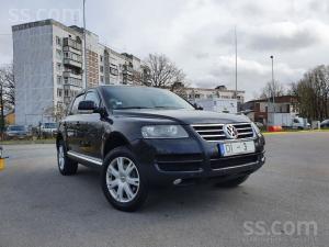 Melns Volkswagen Touareg 2007 Rīga, ar dzinēja tilpumu 3.00 L un nobraukumu 303 tūkst. km par 4400 €, foto  vietnē AUTOMOTO.COM.LV