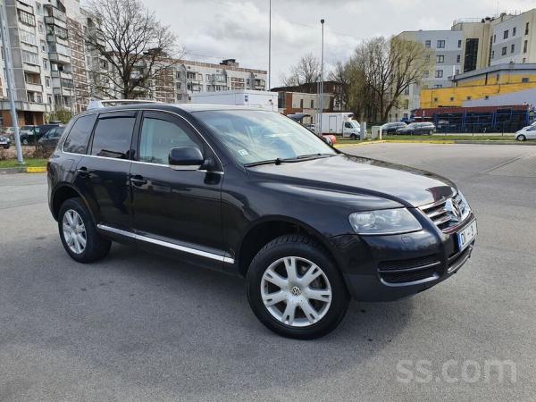 Melns Volkswagen Touareg 2007 Rīga, ar dzinēja tilpumu 3.00 L un nobraukumu 303 tūkst. km par 4400 €, foto 3 vietnē AUTOMOTO.COM.LV