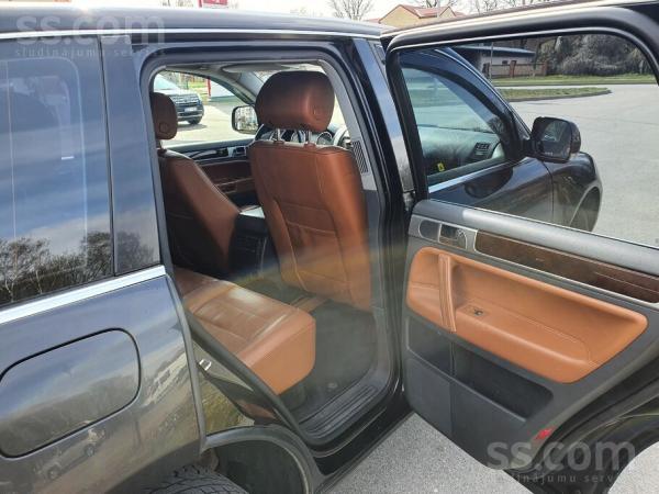 Melns Volkswagen Touareg 2007 Rīga, ar dzinēja tilpumu 3.00 L un nobraukumu 303 tūkst. km par 4400 €, foto 7 vietnē AUTOMOTO.COM.LV