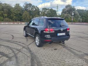 Melns Volkswagen Touareg 2007 Rīga, ar dzinēja tilpumu 3.00 L un nobraukumu 288 tūkst. km par 5500 €, foto 5 vietnē AUTOMOTO.COM.LV