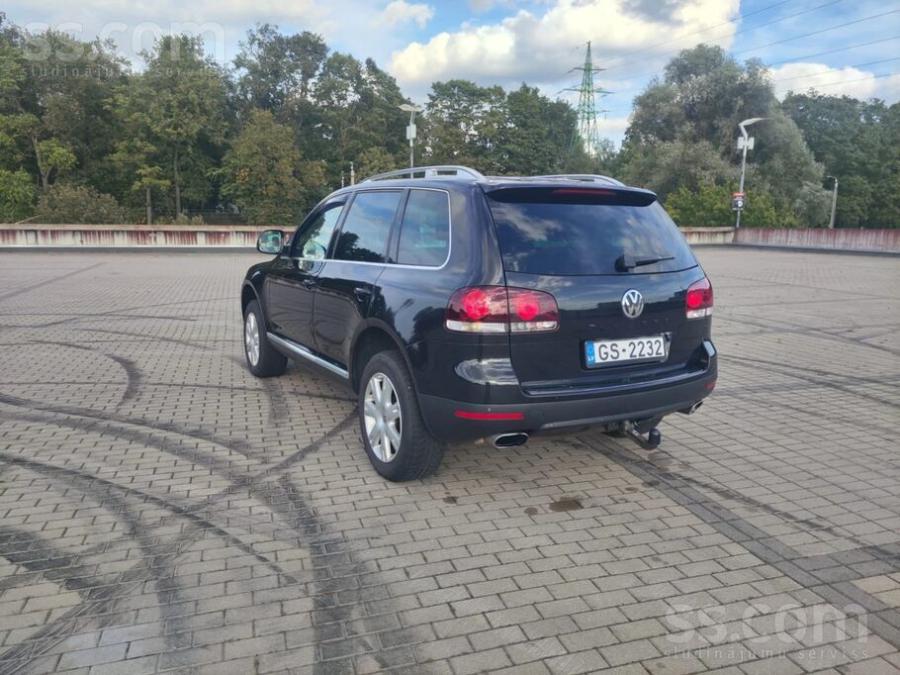 Melns Volkswagen Touareg 2007 Rīga, ar dzinēja tilpumu 3.00 L un nobraukumu 288 tūkst. km par 5500 €, foto 5 vietnē AUTOMOTO.COM.LV