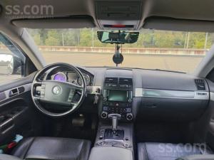 Melns Volkswagen Touareg 2007 Rīga, ar dzinēja tilpumu 3.00 L un nobraukumu 288 tūkst. km par 5500 €, foto 6 vietnē AUTOMOTO.COM.LV