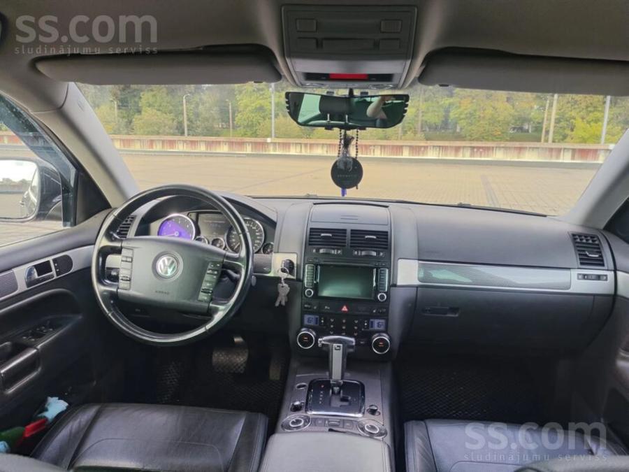 Melns Volkswagen Touareg 2007 Rīga, ar dzinēja tilpumu 3.00 L un nobraukumu 288 tūkst. km par 5500 €, foto 6 vietnē AUTOMOTO.COM.LV