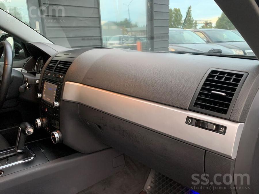 Melns Volkswagen Touareg 2007 Rīga, ar dzinēja tilpumu 3.00 L un nobraukumu 369 tūkst. km par 5500 €, foto 11 vietnē AUTOMOTO.COM.LV