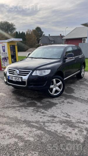 Black Volkswagen Touareg 2007 in Riga, with an engine capacity of 3.00 L and mileage of 277 thousand km for 8000 €, photo  on AUTOMOTO.COM.LV