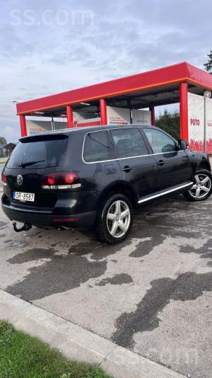 Melns Volkswagen Touareg 2007 Rīga, ar dzinēja tilpumu 3.00 L un nobraukumu 277 tūkst. km par 8000 €, foto 4 vietnē AUTOMOTO.COM.LV