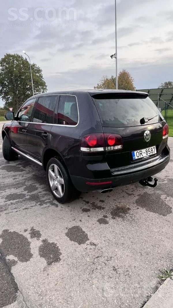 Volkswagen Touareg 2007 in Riga on AUTOMOTO.COM.LV Black Volkswagen Touareg 2007 in Riga, with an engine capacity of 3.00 L and mileage of 277 thousand km for 8000 €, photo 5 on AUTOMOTO.COM.LV