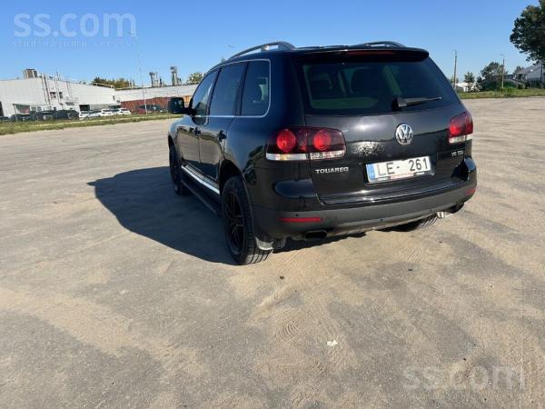 Black Volkswagen Touareg 2008 in Riga, with an engine capacity of 3.00 L and mileage of 291 thousand km for 3500 €, photo 3 on AUTOMOTO.COM.LV