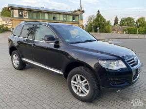 Black Volkswagen Touareg 2008 in Utena, with an engine capacity of 3.00 L and mileage of 311 thousand km for 7950 €, photo 10 on AUTOMOTO.COM.LV