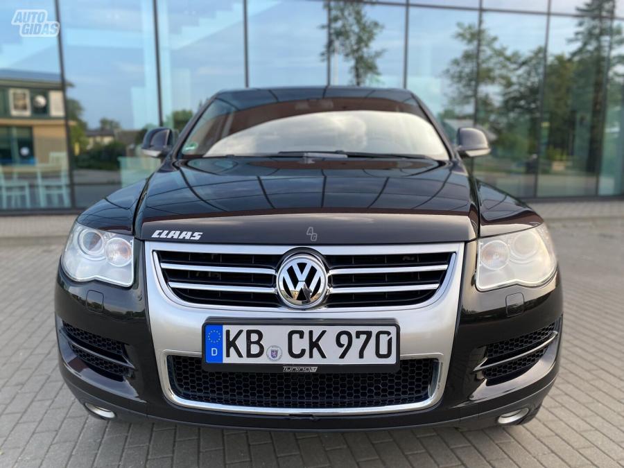 Black Volkswagen Touareg 2008 in Utena, with an engine capacity of 3.00 L and mileage of 311 thousand km for 7950 €, photo 12 on AUTOMOTO.COM.LV