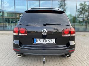 Black Volkswagen Touareg 2008 in Utena, with an engine capacity of 3.00 L and mileage of 311 thousand km for 7950 €, photo 14 on AUTOMOTO.COM.LV