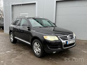 Black Volkswagen Touareg 2008 in Riga, with an engine capacity of 3.00 L and mileage of 392 thousand km for 4400 €, photo 3 on AUTOMOTO.COM.LV