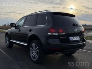 Melns Volkswagen Touareg 2008 Liepāja, ar dzinēja tilpumu 3.00 L un nobraukumu 277 tūkst. km par 8400 €, foto 4 vietnē AUTOMOTO.COM.LV