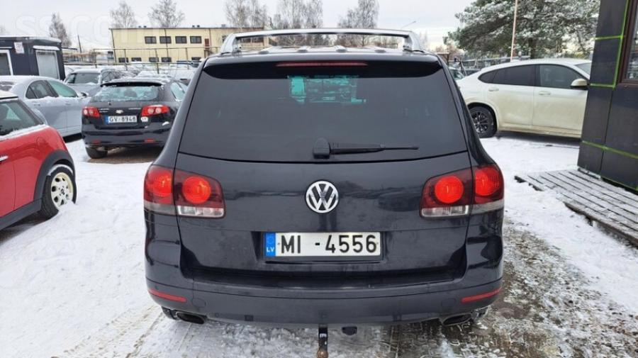 Black Volkswagen Touareg 2008 in Riga, with an engine capacity of 3.00 L and mileage of 319 thousand km for 5900 €, photo 18 on AUTOMOTO.COM.LV