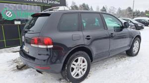 Black Volkswagen Touareg 2008 in Riga, with an engine capacity of 3.00 L and mileage of 319 thousand km for 5900 €, photo 23 on AUTOMOTO.COM.LV