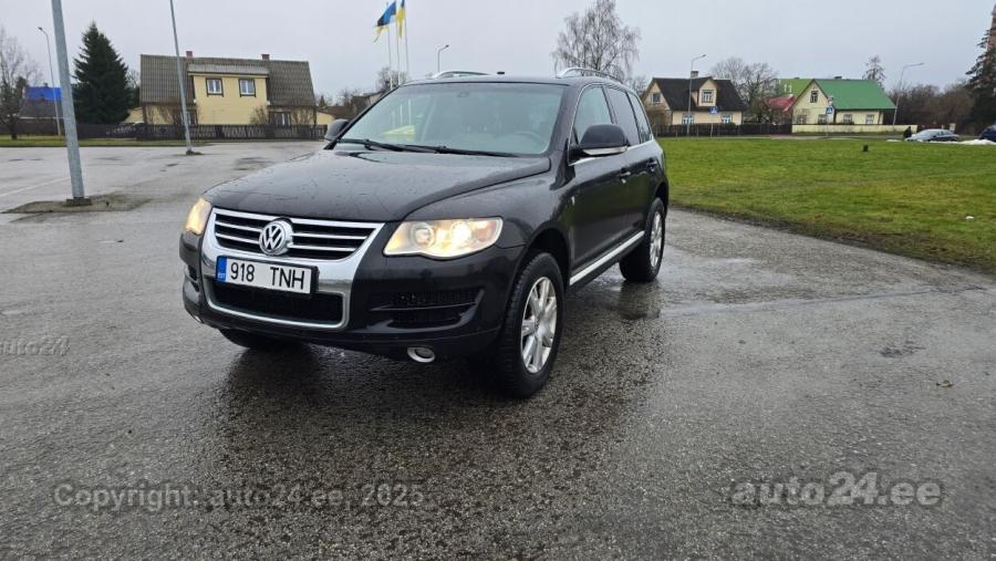 Black Volkswagen Touareg 2008 in Tallinn, with an engine capacity of 3.00 L and mileage of 375 thousand km for 4200 €, photo 2 on AUTOMOTO.COM.LV