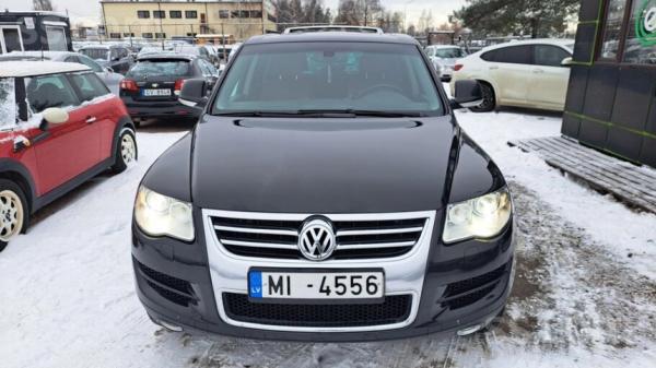 Black Volkswagen Touareg 2008 in Riga, with an engine capacity of 3.00 L and mileage of 319 thousand km for 6500 €, photo 6 on AUTOMOTO.COM.LV